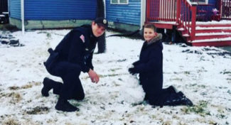 Alumnus plays two roles in the community