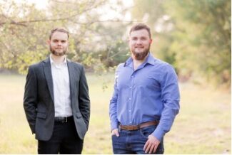 Professor John McCormick moonlights as a real estate agent with his two sons