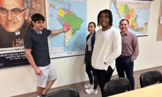 Former Newman student team-teaches class with past professor